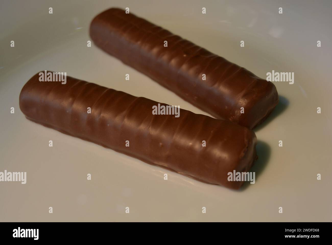 Sweets, sticks covered with milk chocolate, shortbread liver and ...