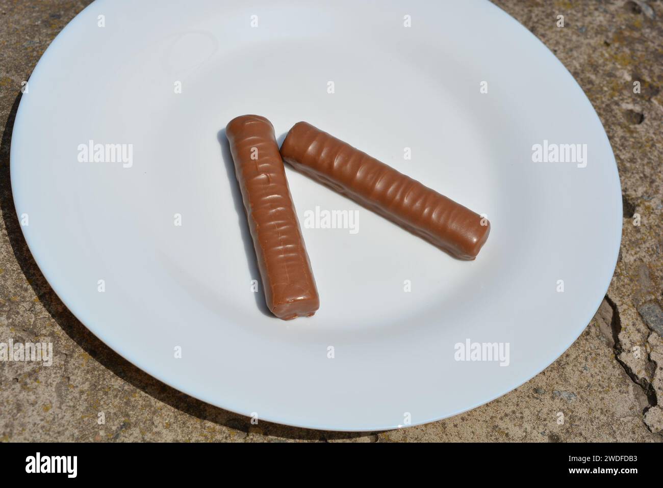 Sweets, sticks covered with milk chocolate, shortbread liver and ...