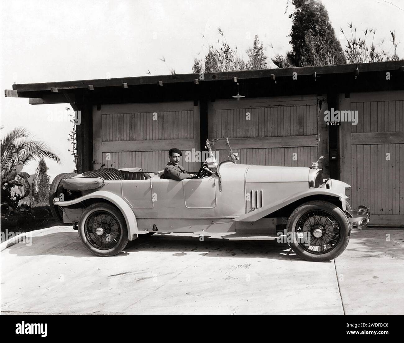 Rudolph Valentino in a cabriolet Voisin sports car, 1920s Stock Photo ...