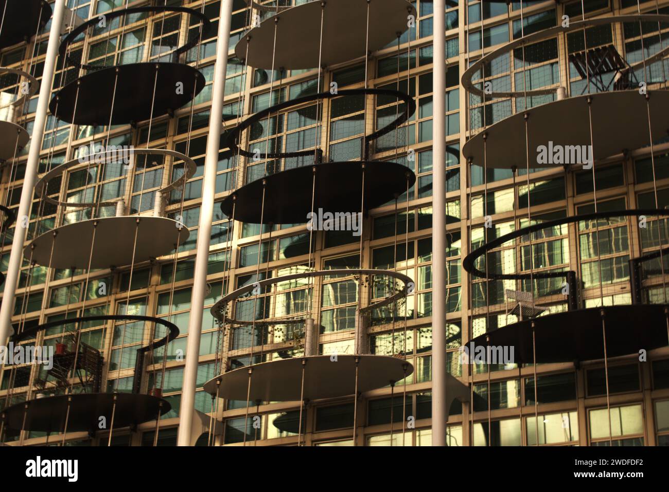 Circular design of building reflecting other buildings and its ...