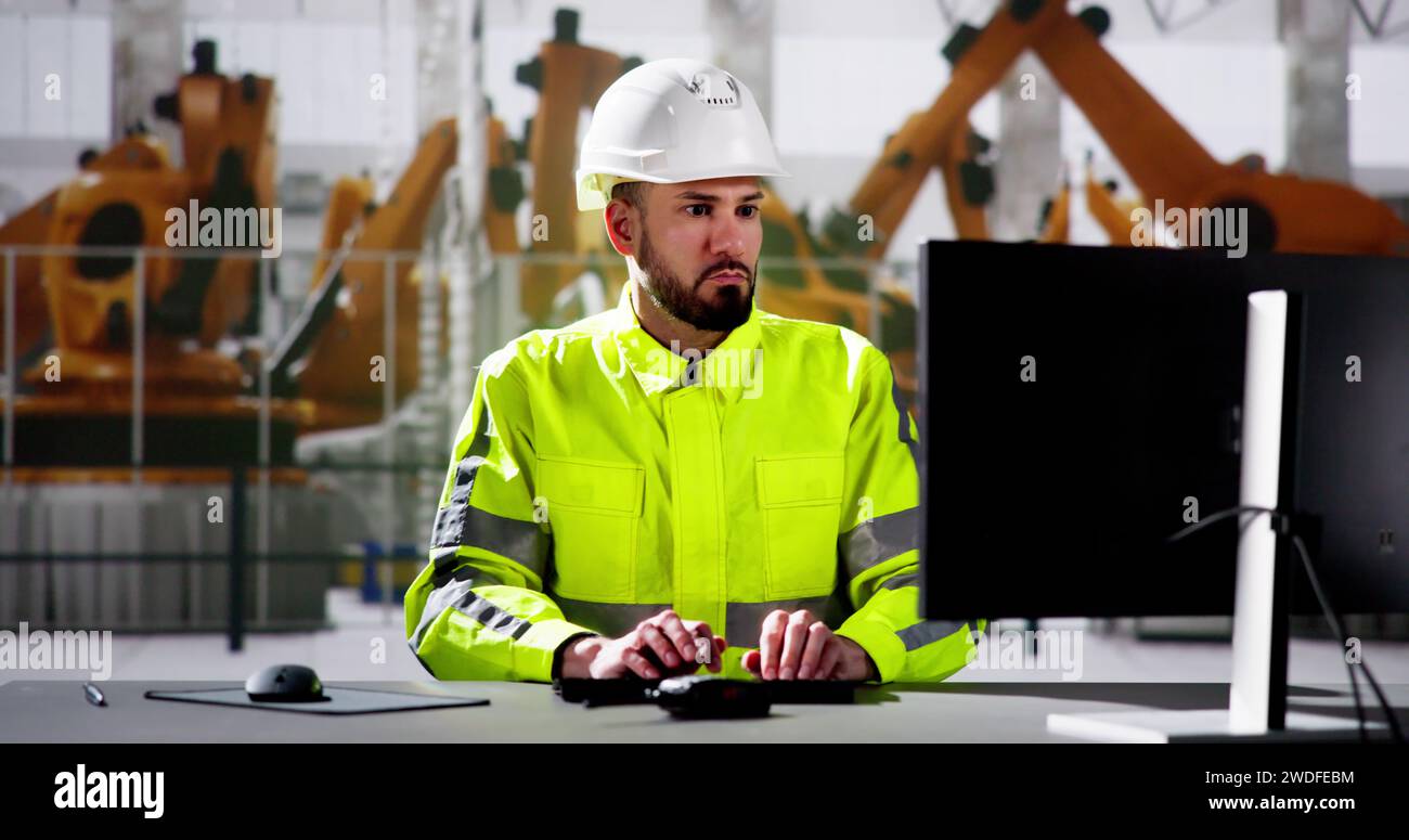 Engineer Using PC In Car Factory Automated Assembly Line Stock Photo ...
