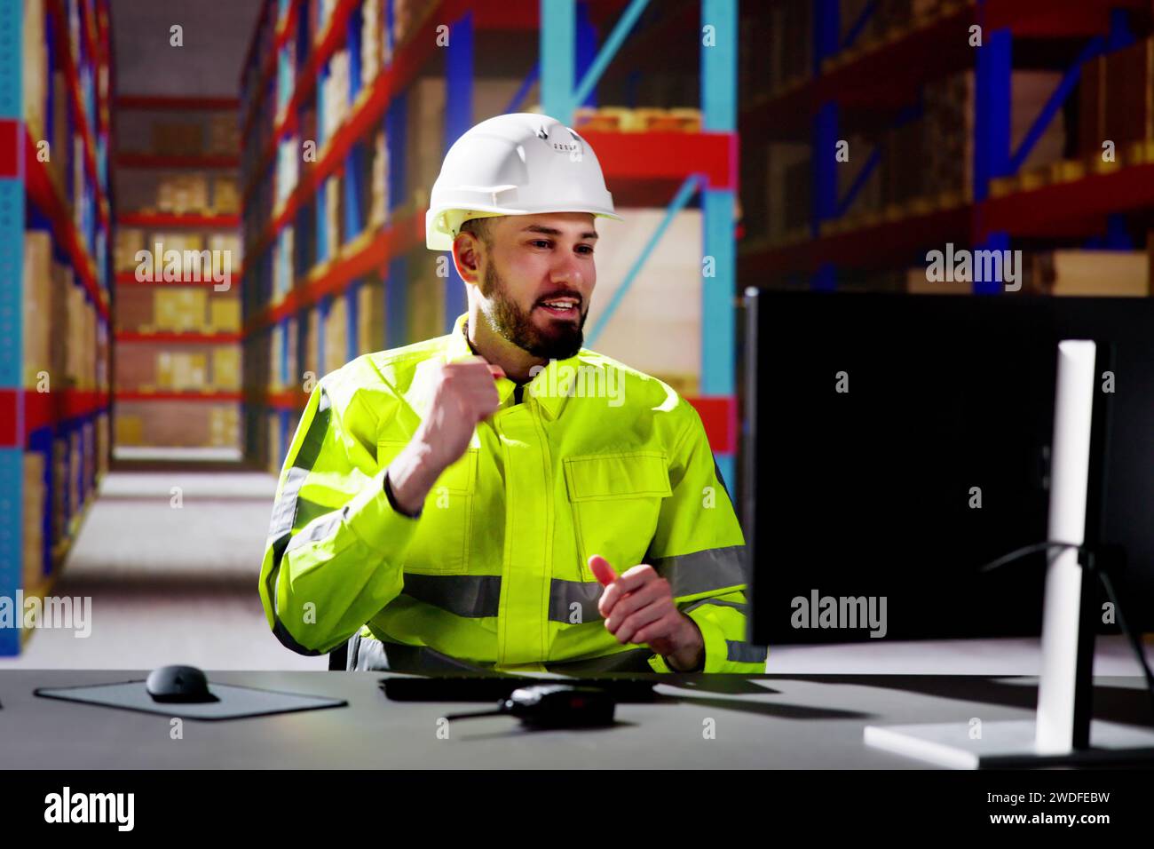 Excited Cheering Engineer Using PC In Automated Logistics Warehouse ...