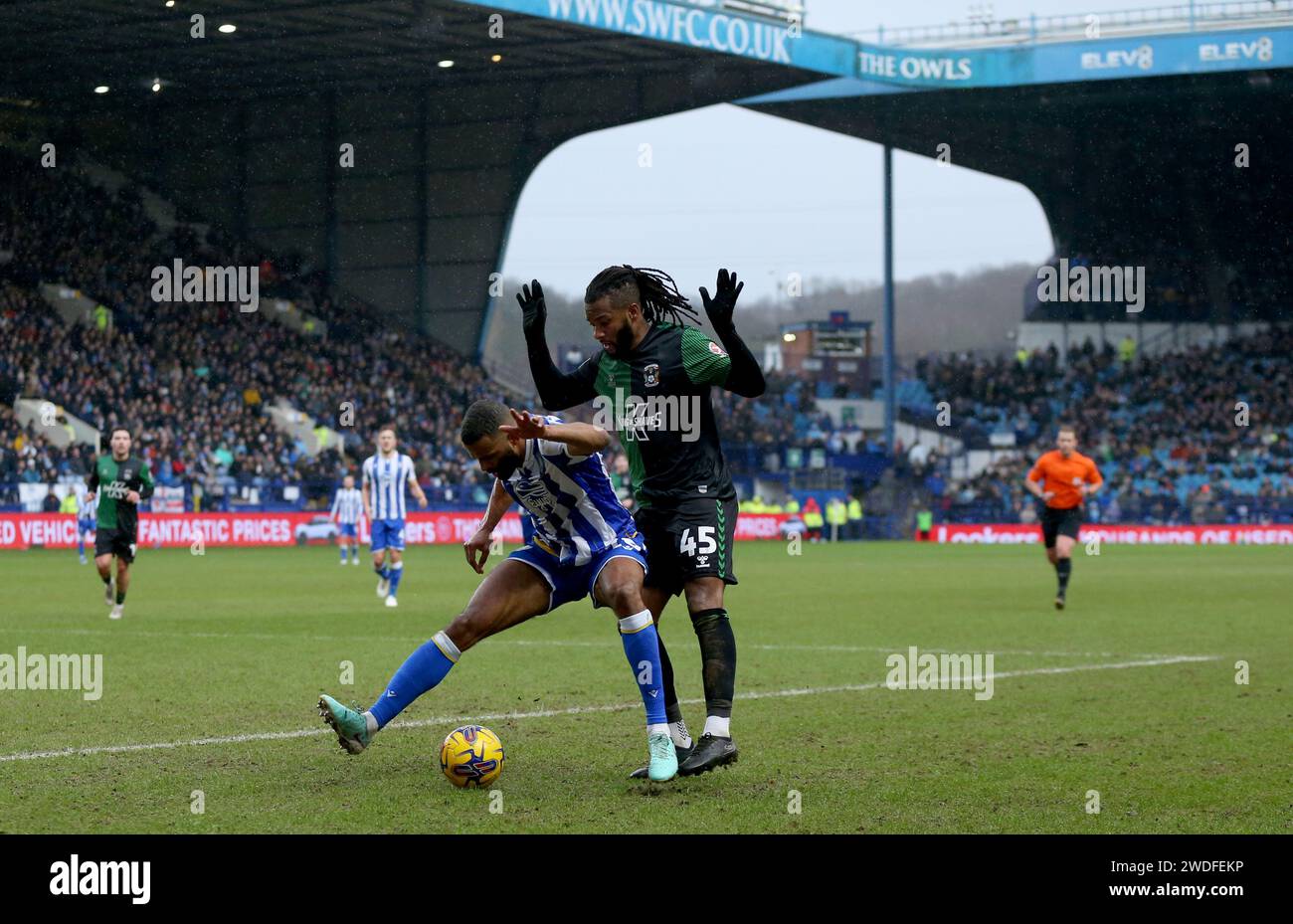 Sheffield Wednesday's Liam Palmer (left) and Coventry City's Kasey ...