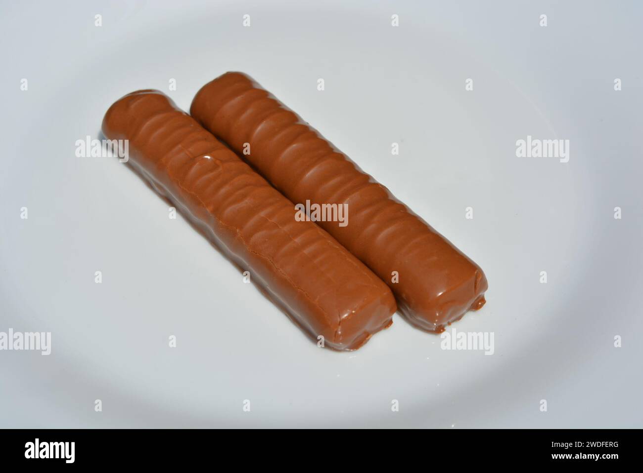 Sweets, sticks covered with milk chocolate, shortbread liver and ...