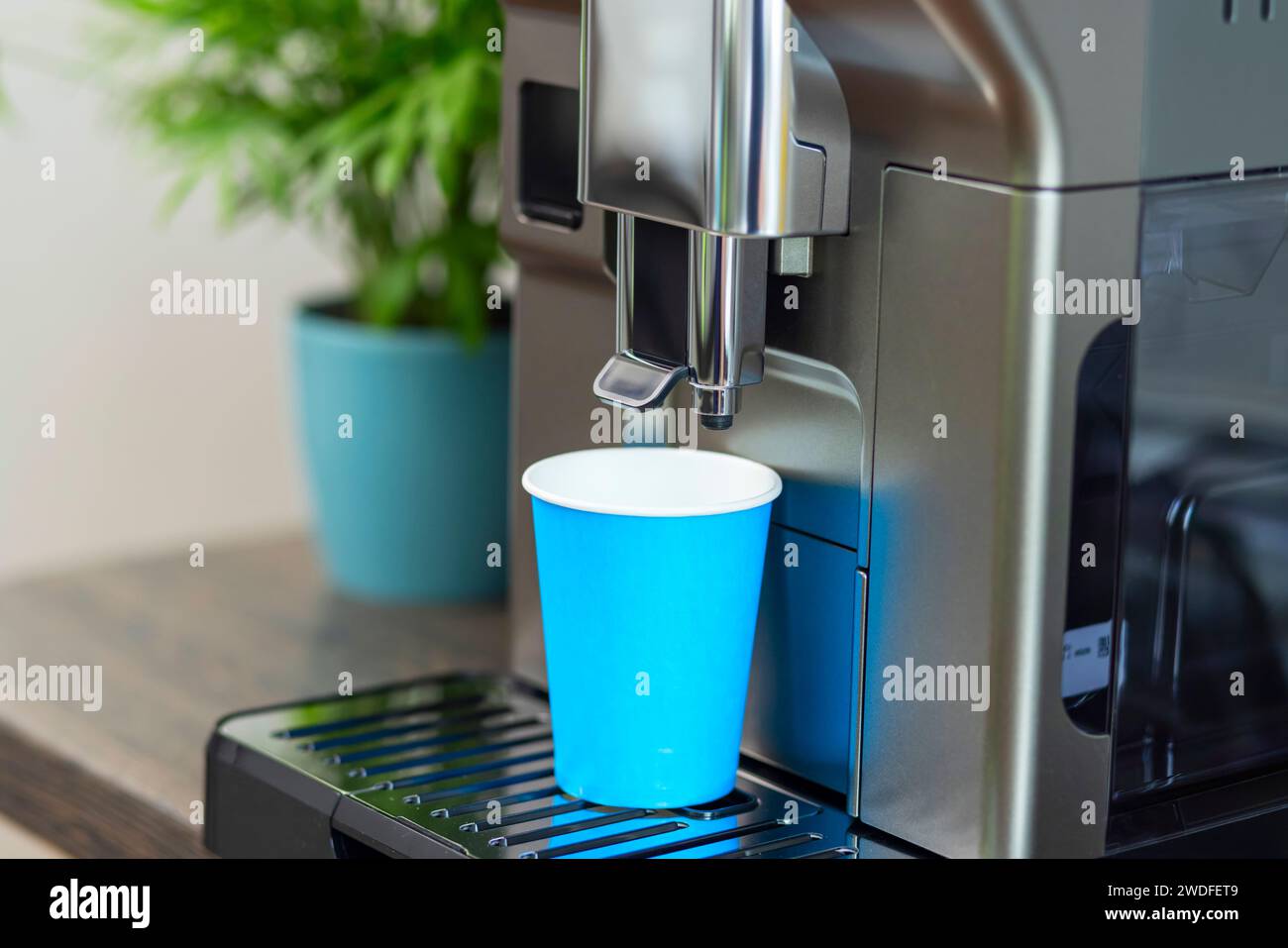 Blue Cup Ready for Fresh Brew from Modern Coffee Machine Stock Photo ...
