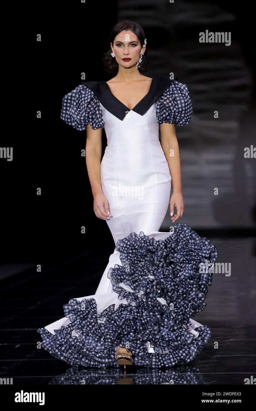 Seville, Spain. 20th Jan, 2024. A model is walking the runway at the ...