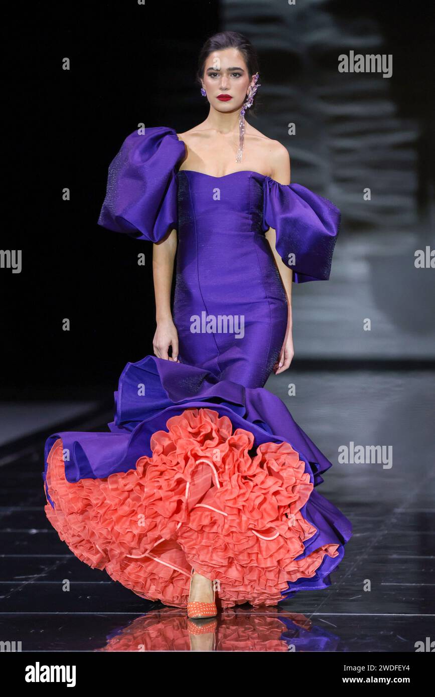 Seville, Spain. 20th Jan, 2024. A model is walking the runway at the ...