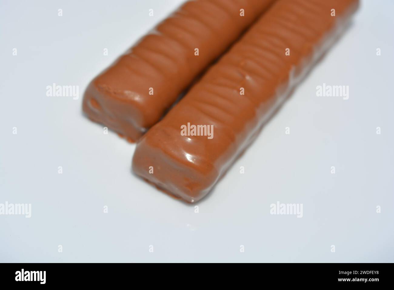 Sweets, sticks covered with milk chocolate, shortbread liver and ...