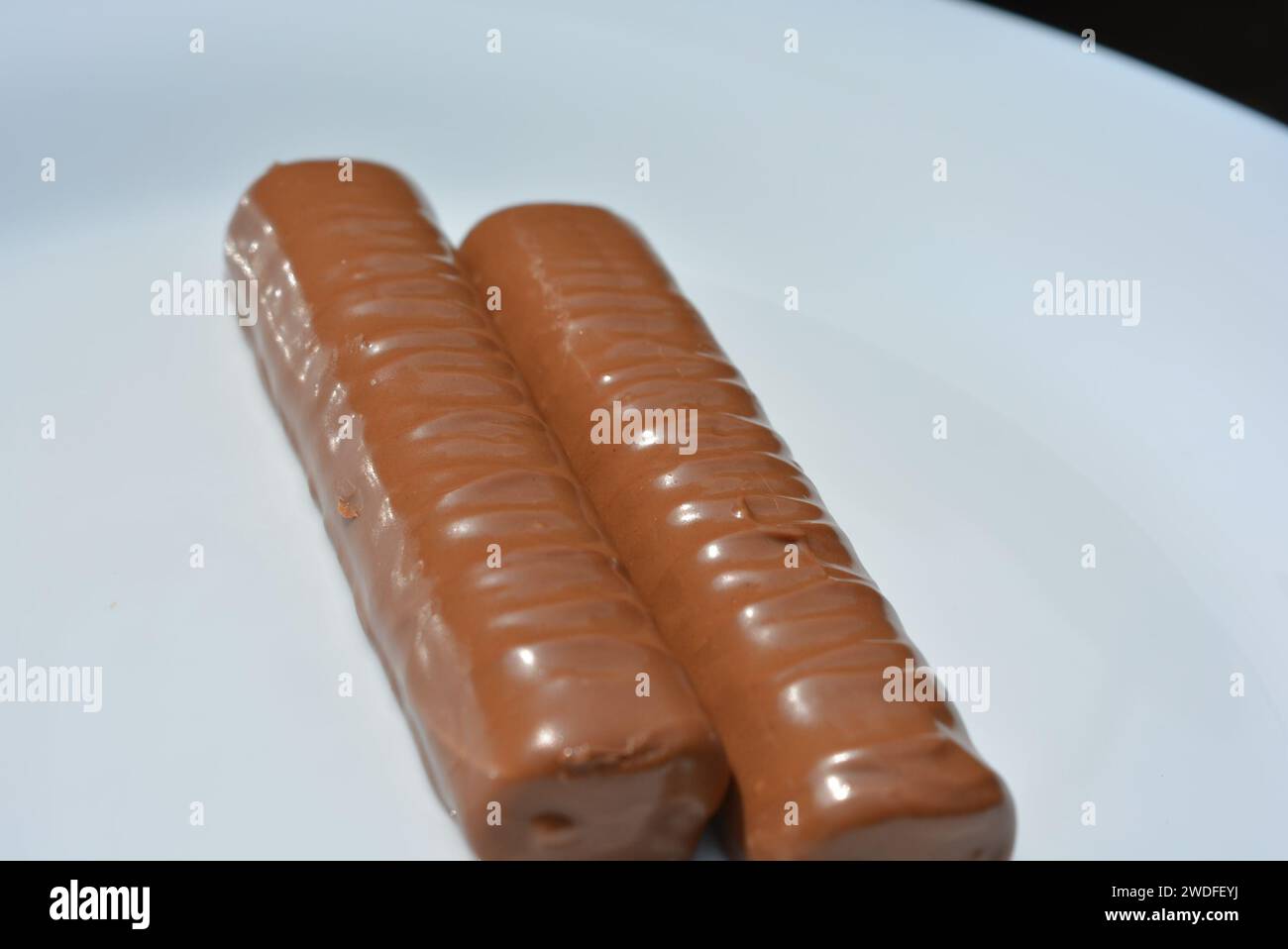 Sweets, sticks covered with milk chocolate, shortbread liver and ...