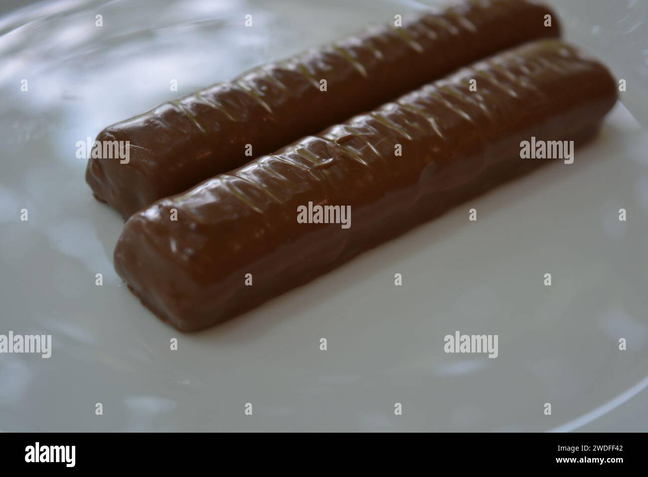 Sweets, sticks covered with milk chocolate, shortbread liver and ...