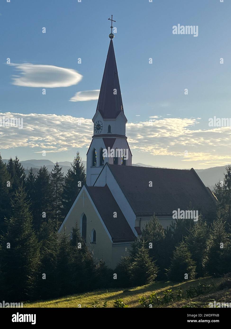 Scenic church amidst lush green surroundings, embraced by trees Stock ...