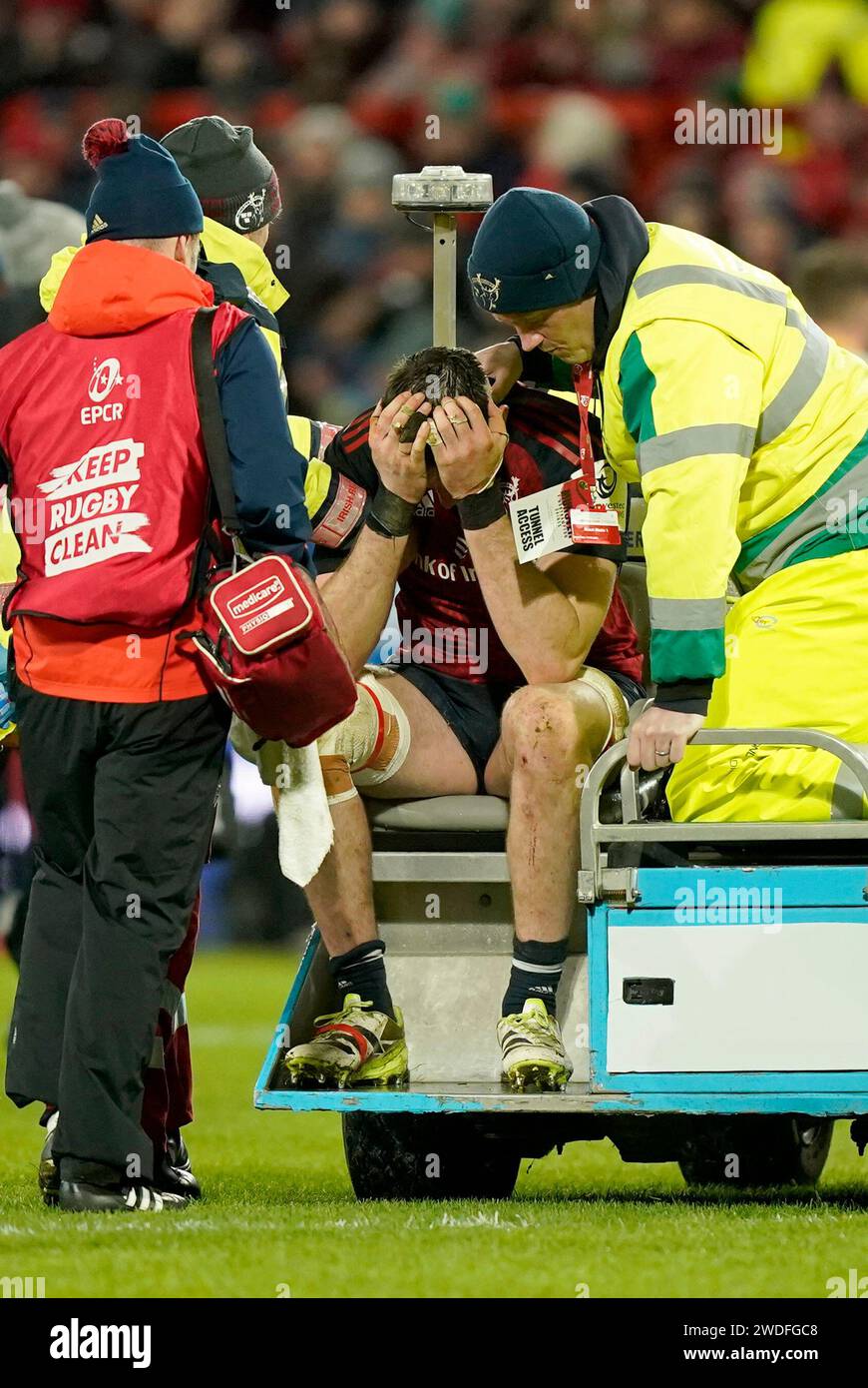 Munster's Tom Ahern is stretchered from the field during the Investec ...