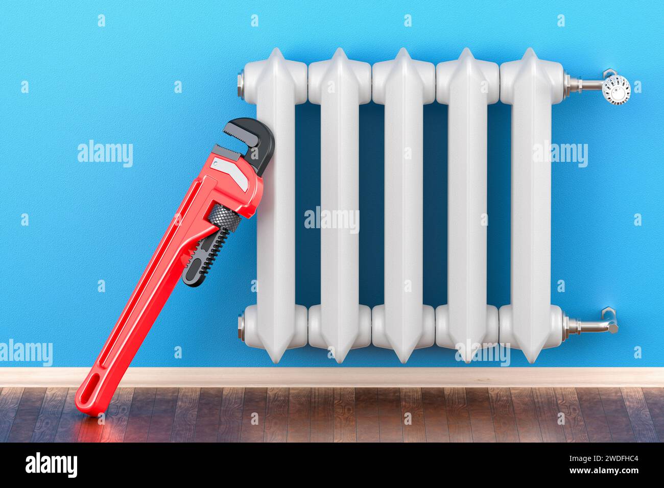 Cast iron heating radiator with pipe wrench in interior. Repair and ...
