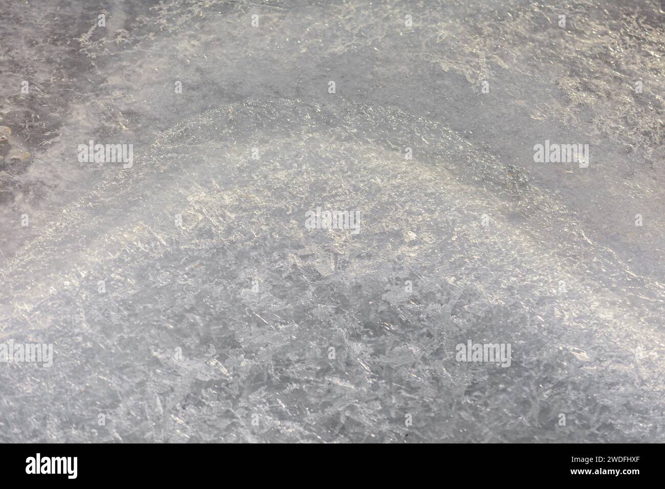 Abstract image of coarse ice crystals in an estuary marsh near ...