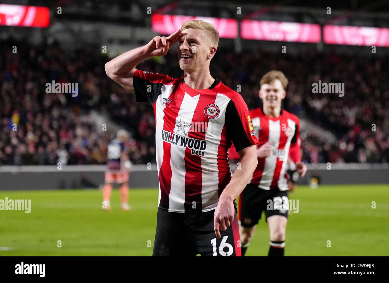 Brentford's Ben Mee celebrates scoring their side's second goal of the ...