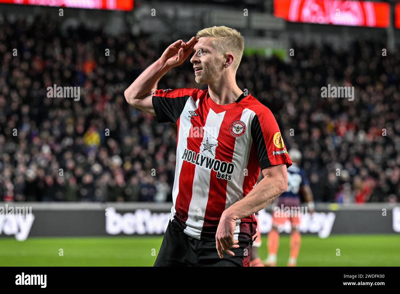 London, UK. 20th Jan, 2024. Ben Mee of Brentford celebrates his goal to ...