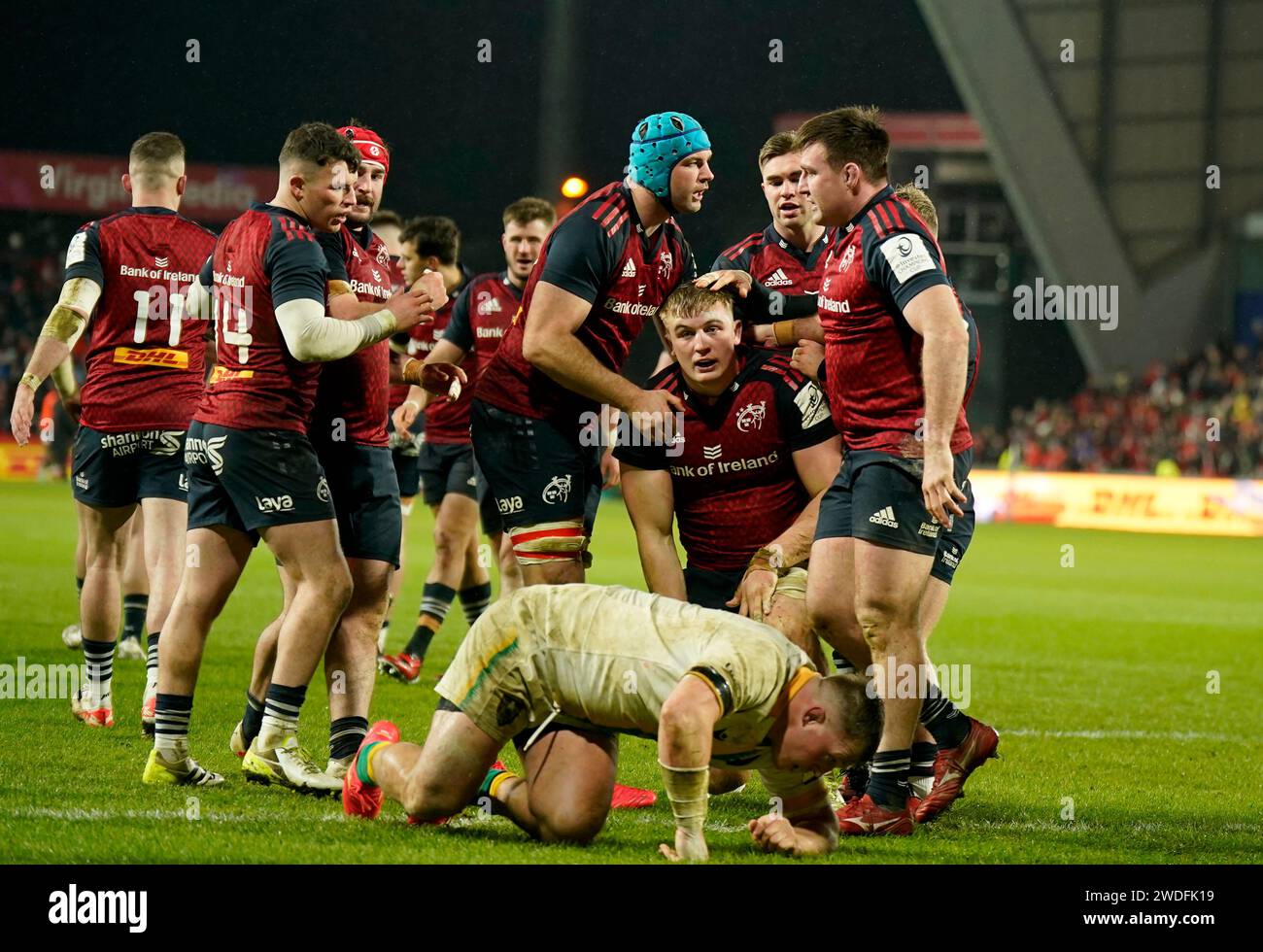 Munster's Gavin Coombes is congratulated by his team mates after ...