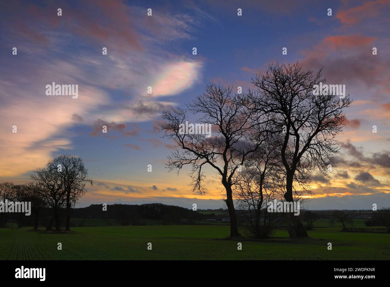 Landscape image with rare Nacreous clouds at sunset near Ferryhill ...