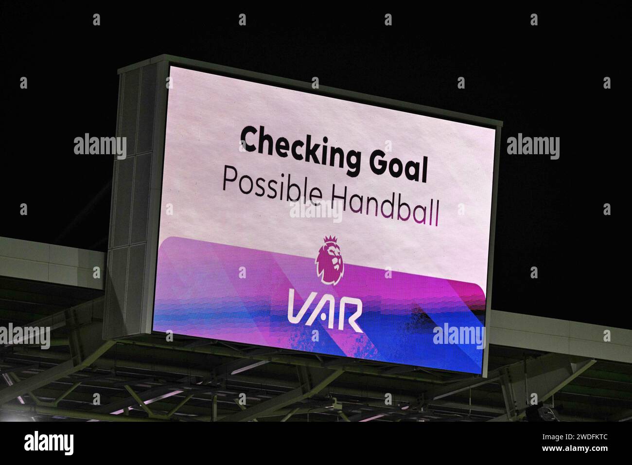 London, UK. 20th Jan, 2024. VAR checks for a possible handball on Neal ...