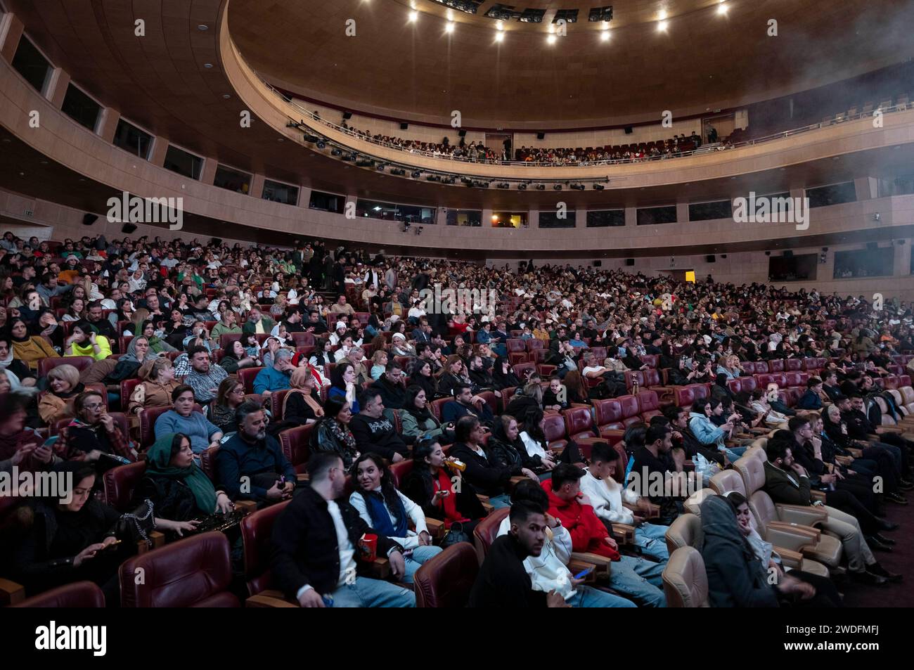 Tehran, Iran. 19th Jan, 2024. Iranian people are attending a concert ...