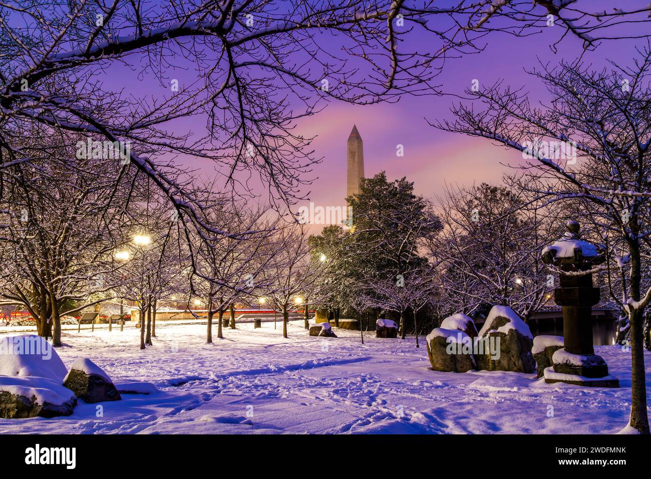 A snow-covered scene taken at the Tidal Basin in Washington, DC, with ...