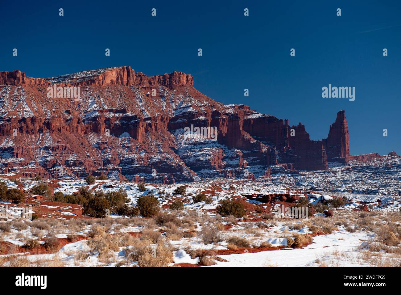 Fisher Towers, a geological feature east of Moab, Utah, on a snowy ...
