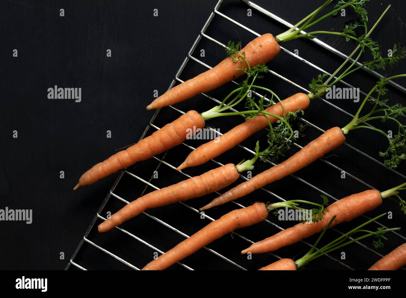 Creative carrots composition food photography Stock Photo - Alamy
