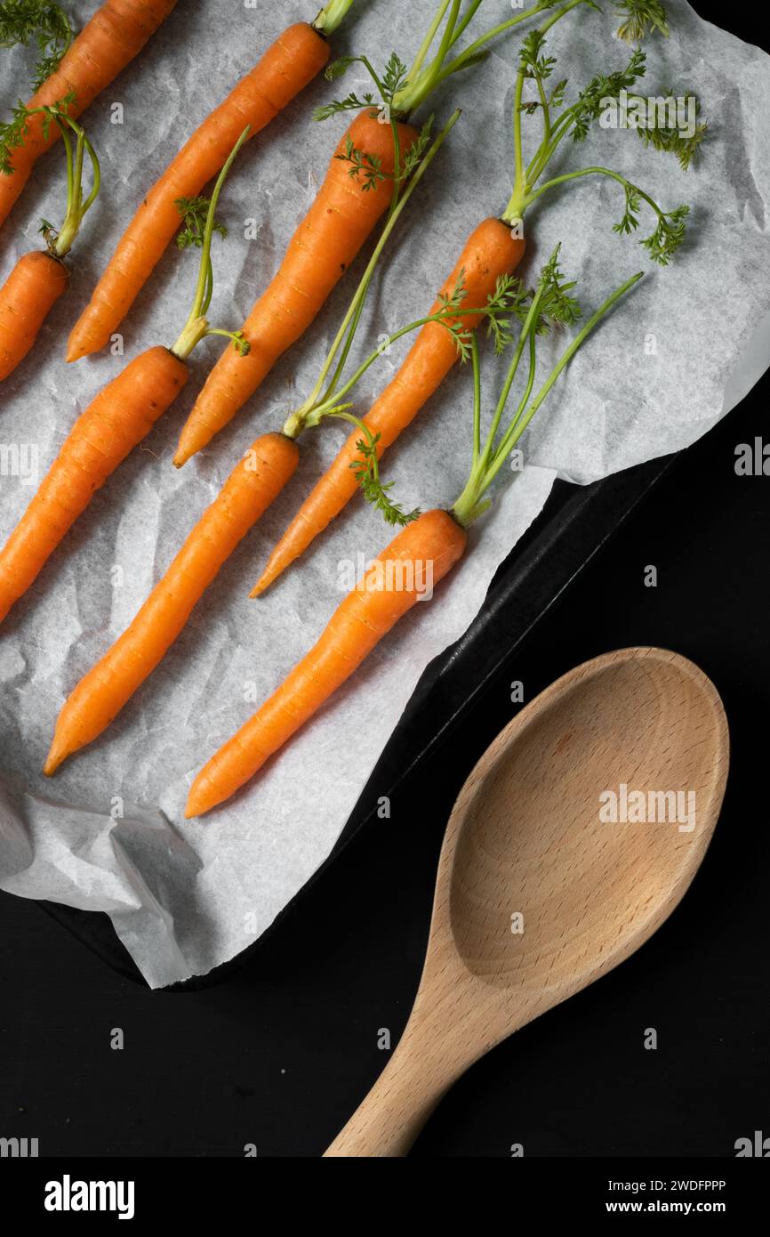 Creative carrots composition food photography Stock Photo - Alamy