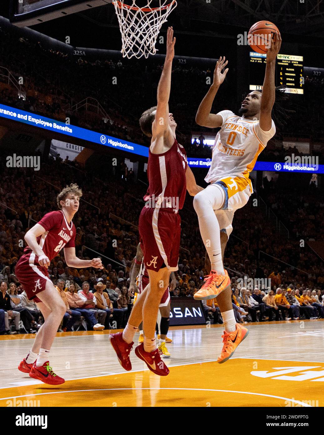 Tennessee forward Jonas Aidoo (0) shoots over Alabama forward Grant ...