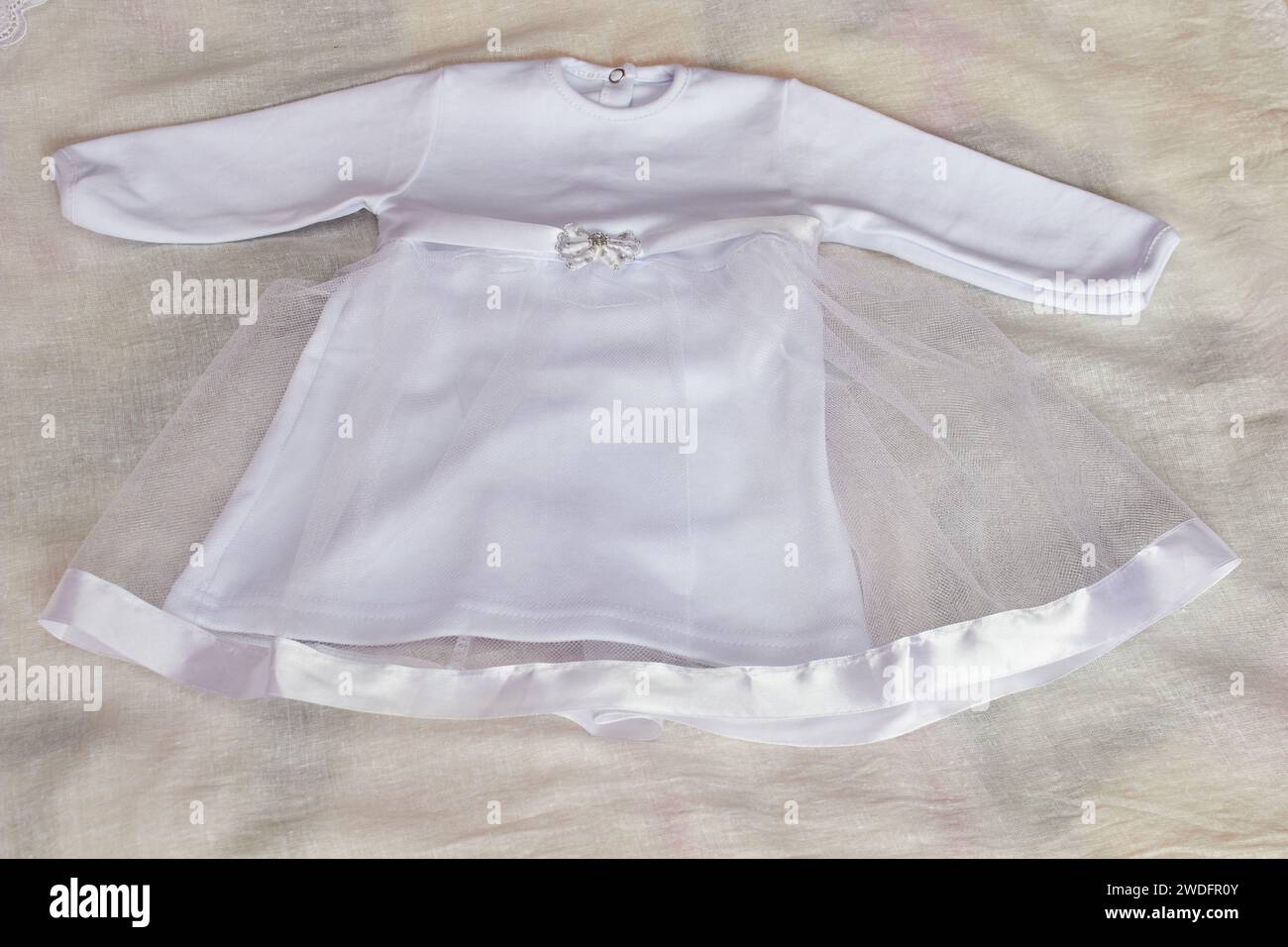 newborn baby girl clothes for church baptism ceremony Stock Photo - Alamy