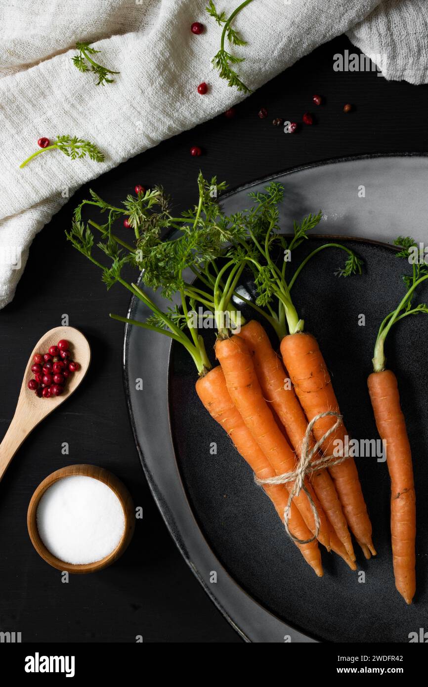 Creative carrots composition food photography Stock Photo - Alamy
