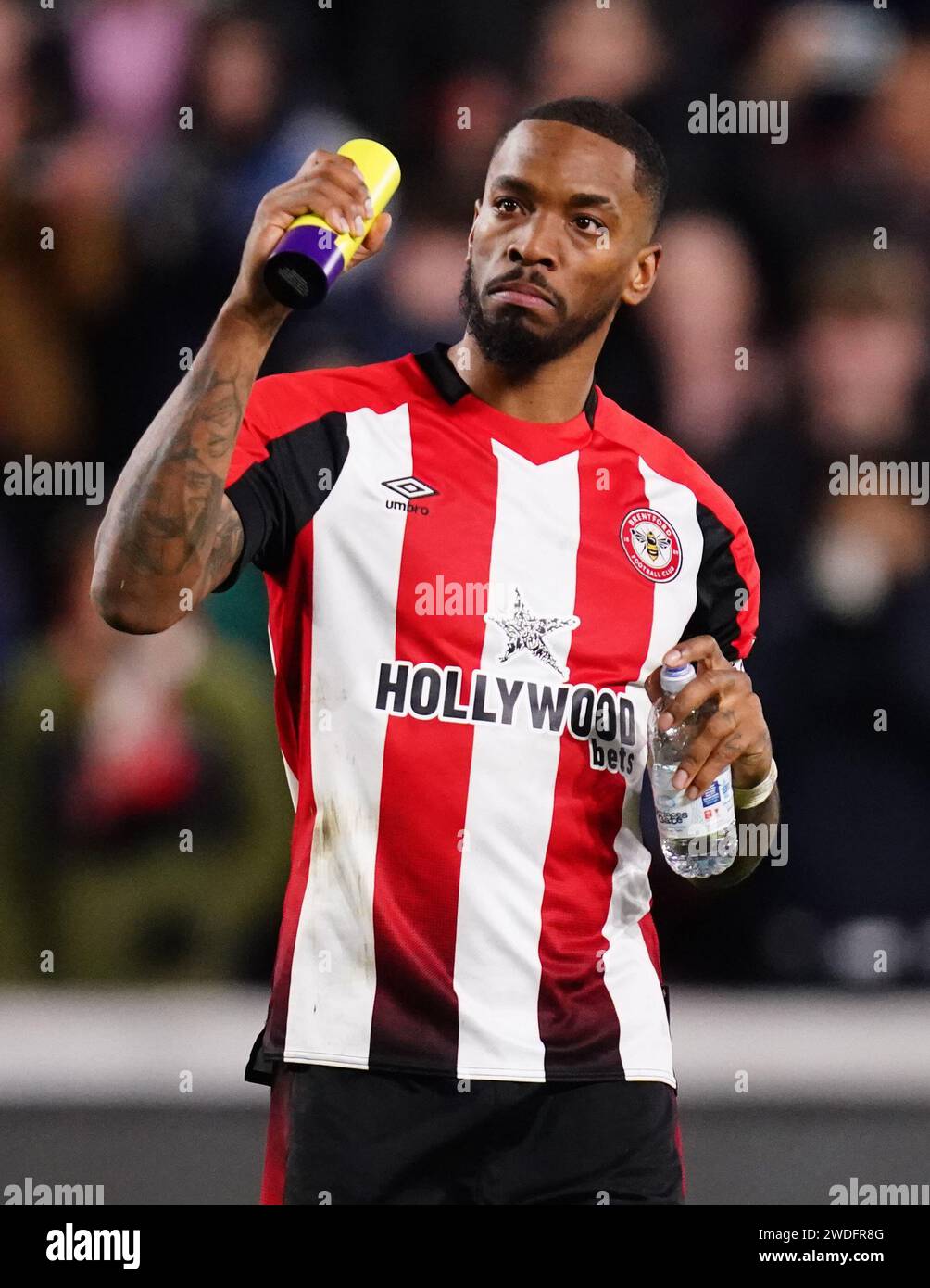 Brentford's Ivan Toney celebrates with his Man of the Match award after ...