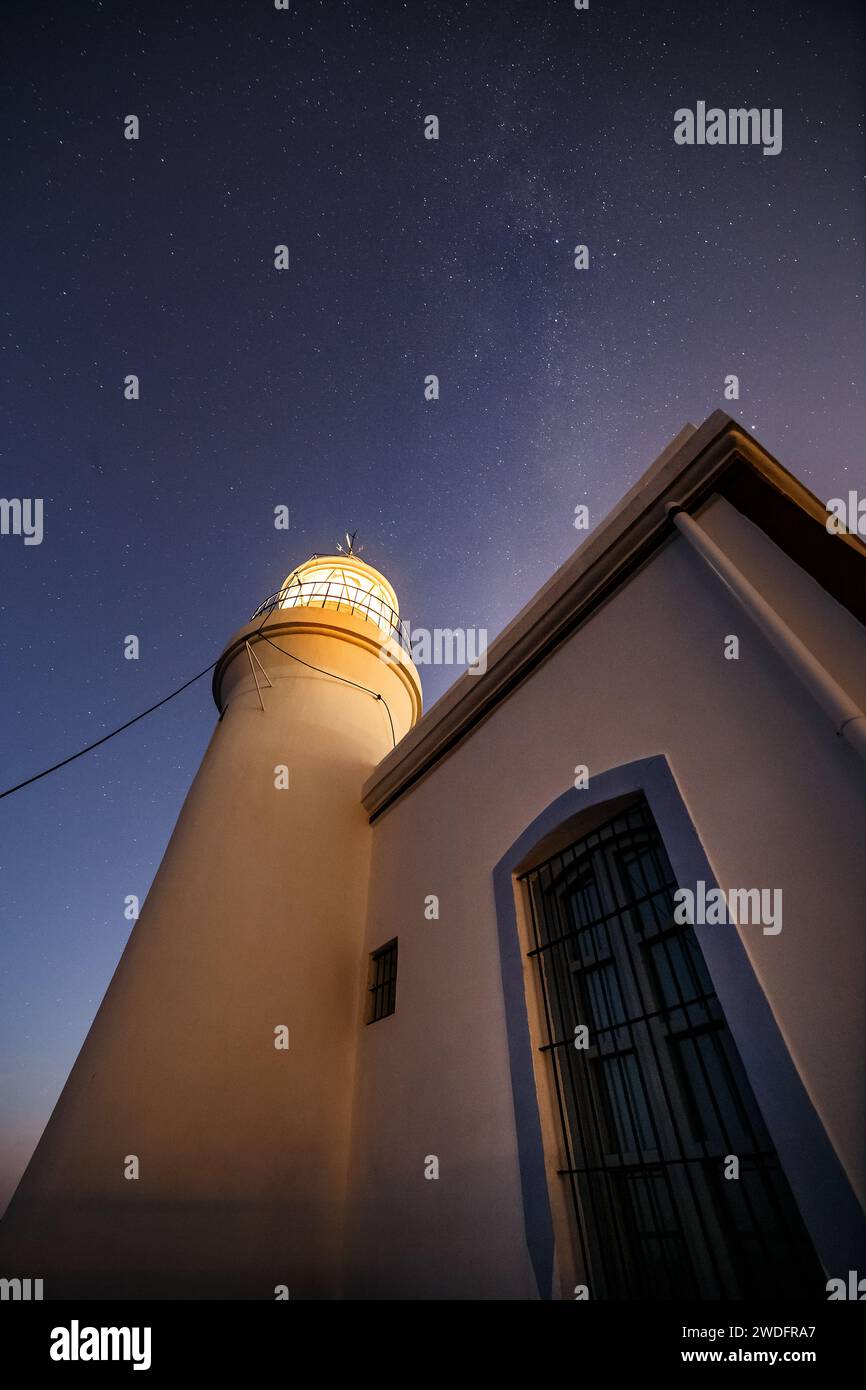 Albir lighthouse under the stars Stock Photo - Alamy