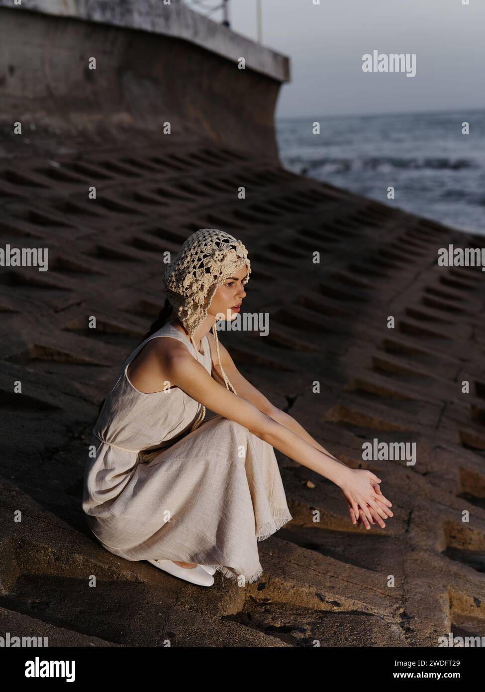 Serene Summer Beauty: A Young Woman with Flowing Hair, Captivated by ...