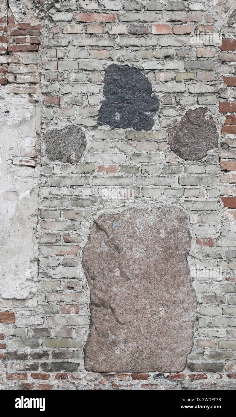 Medieval wall made of bricks and stone. Abstract background Stock Photo ...
