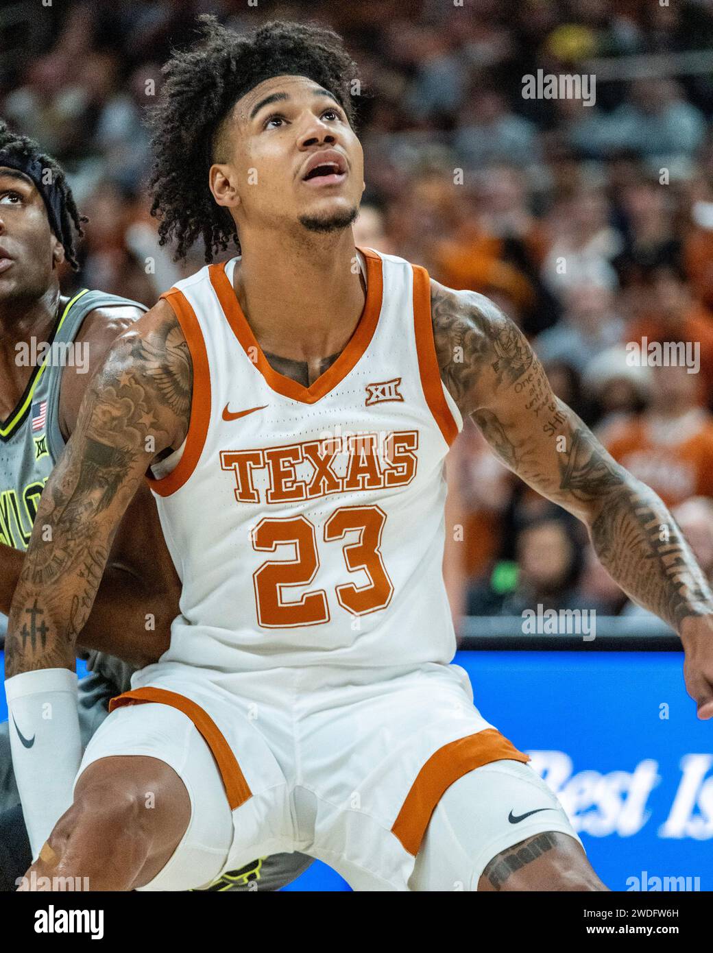 Texas, USA. 20th Jan, 2024. Dillon Mitchell #23 of the Texas Longhorns ...