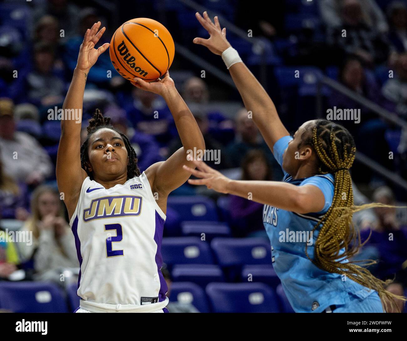 James Madison guard Chloe Sterling (2) takes a shot against Old ...