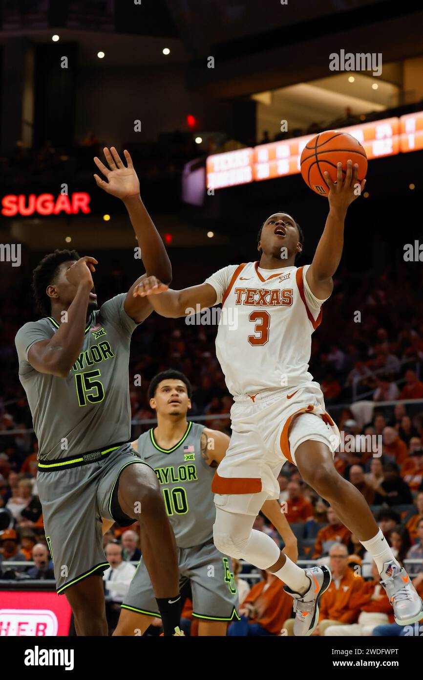 AUSTIN, TX - JANUARY 20: Texas Longhorns guard Max Abmas (3) goes up for a shot while being ...