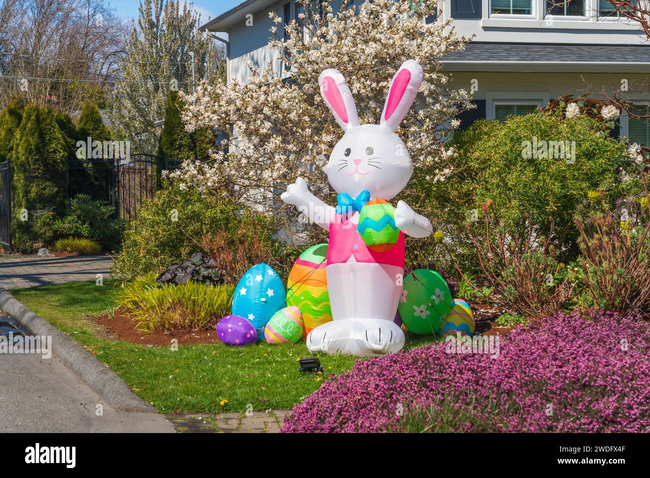 A decorative Easter bunny and eggs on a residential street in Victoria ...