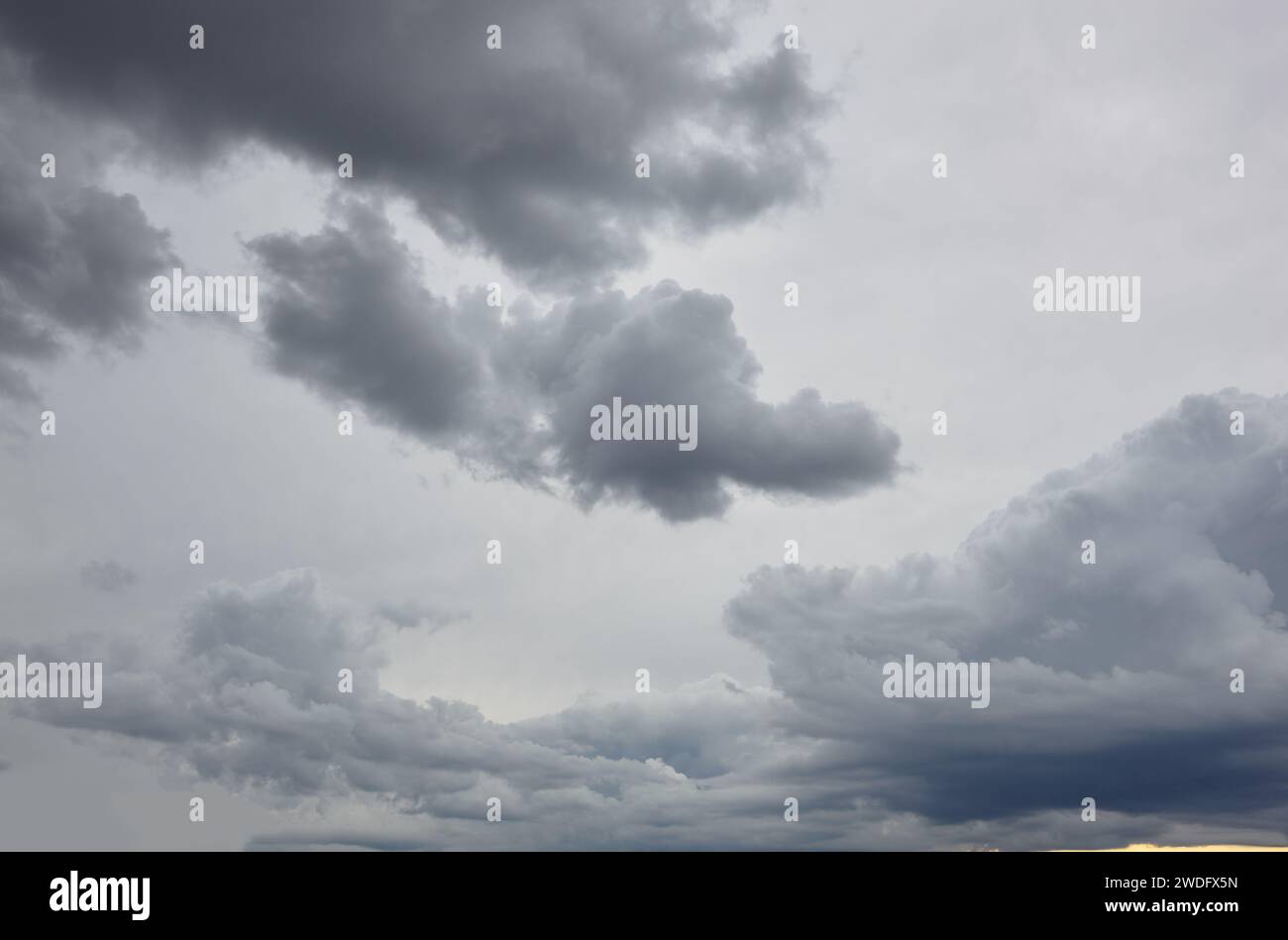 Dramatic dark clouds before rainy. Beautiful cloudscape over horizon ...
