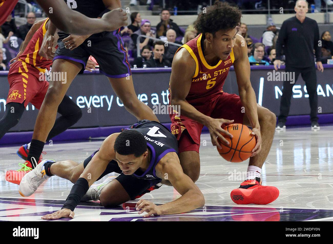 Iowa State guard Curtis Jones (5) gets the ball from TCU guard Jameer ...