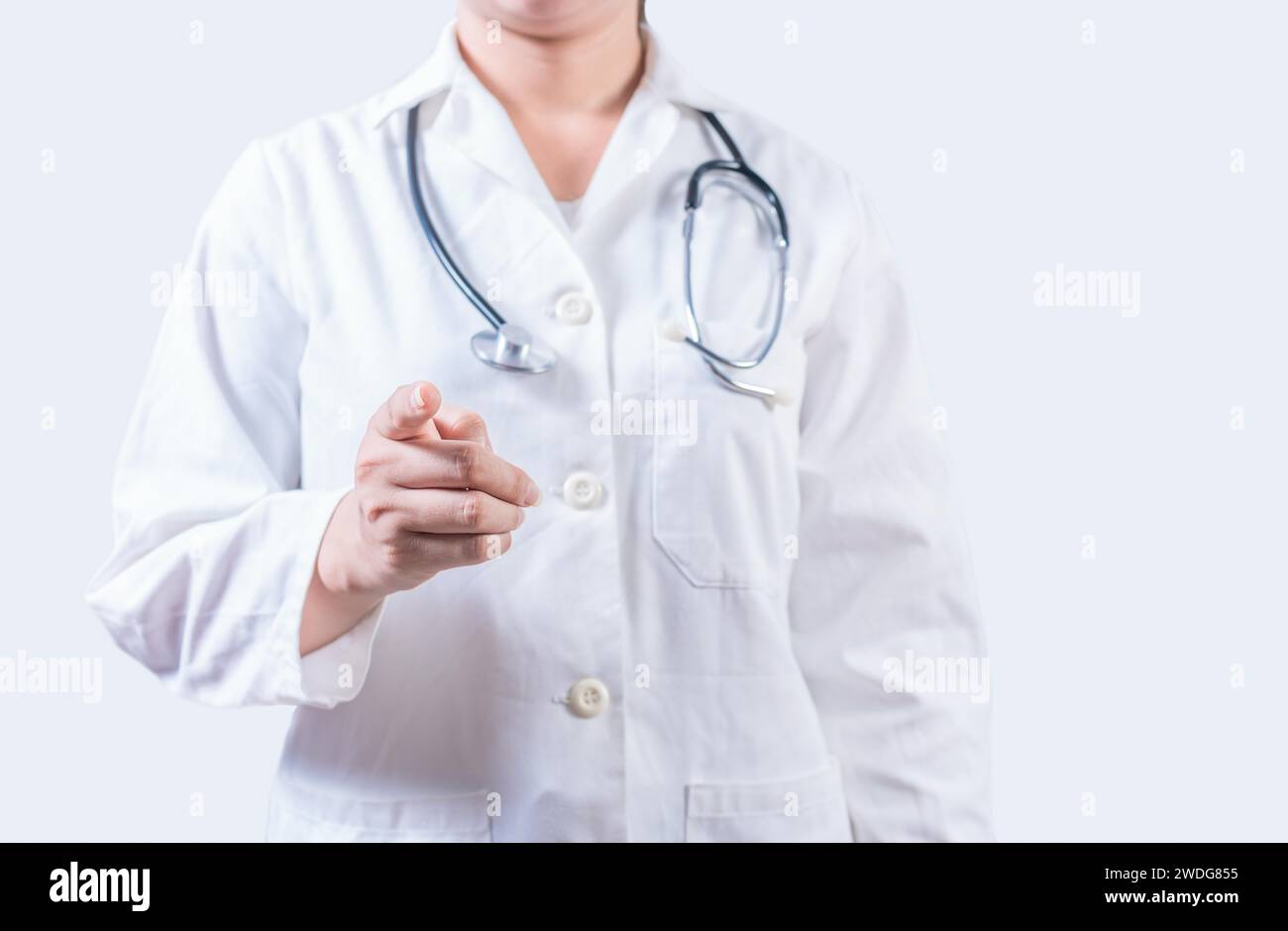 Unrecognizable doctor pointing at the camera. Doctor hands pointing at ...