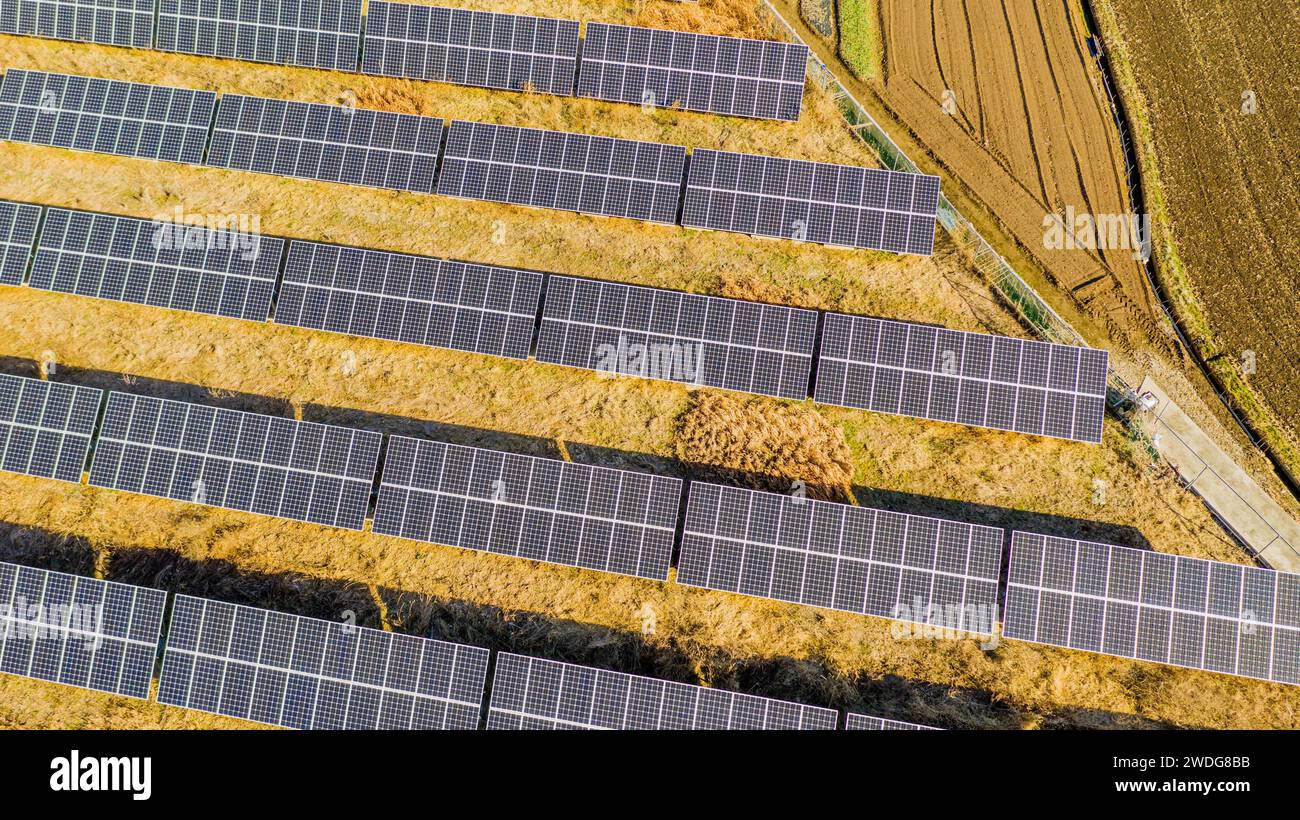 Aerial view of solar panels in rural farming countryside in Byeongam-ri ...