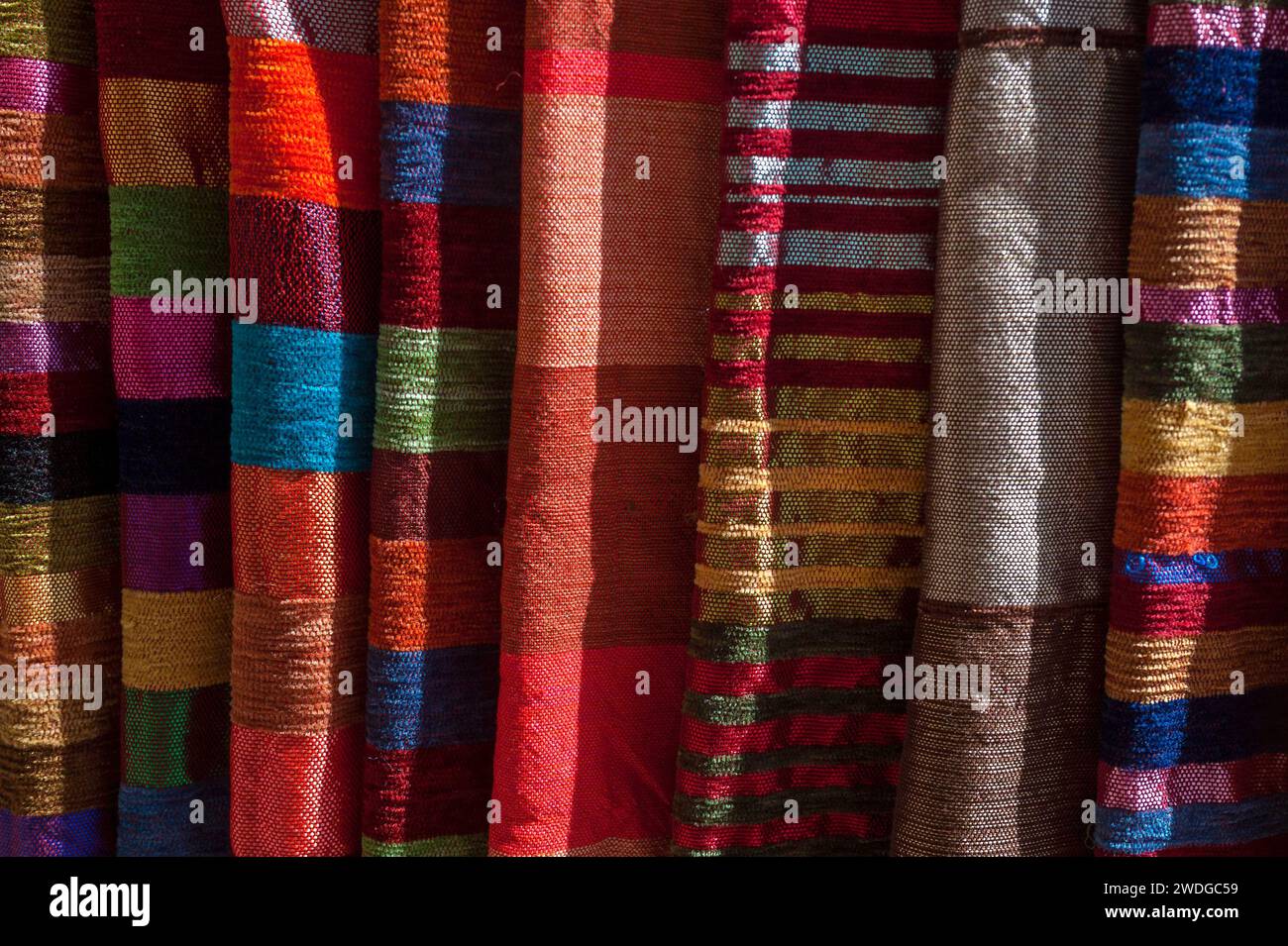Hand-woven fabrics on the market, shopping, cloth, shawls, arabic ...