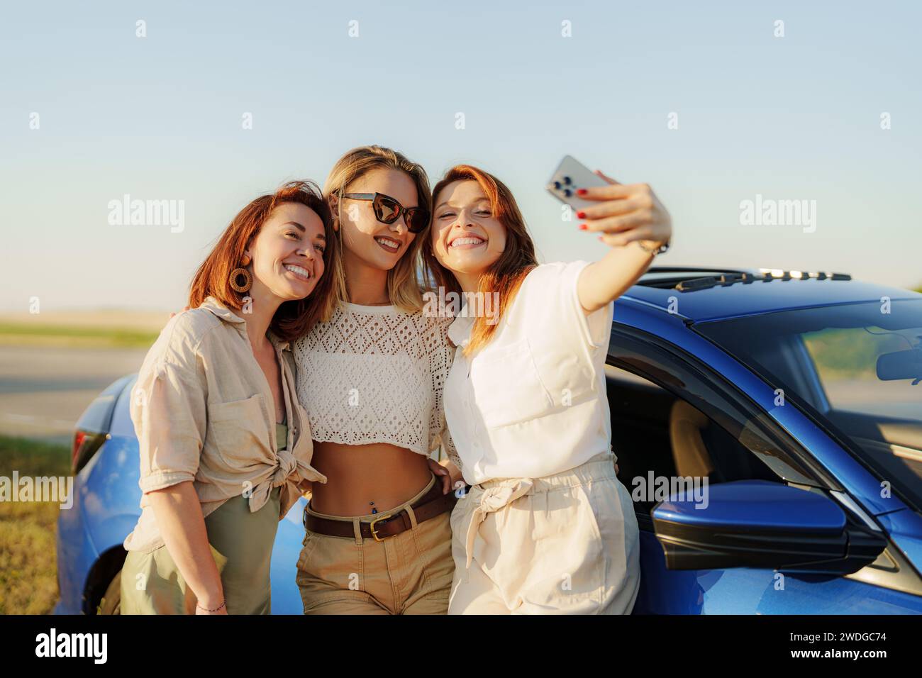 Capturing Memories: Road Trip Selfie in the Sunset Glow Stock Photo - Alamy
