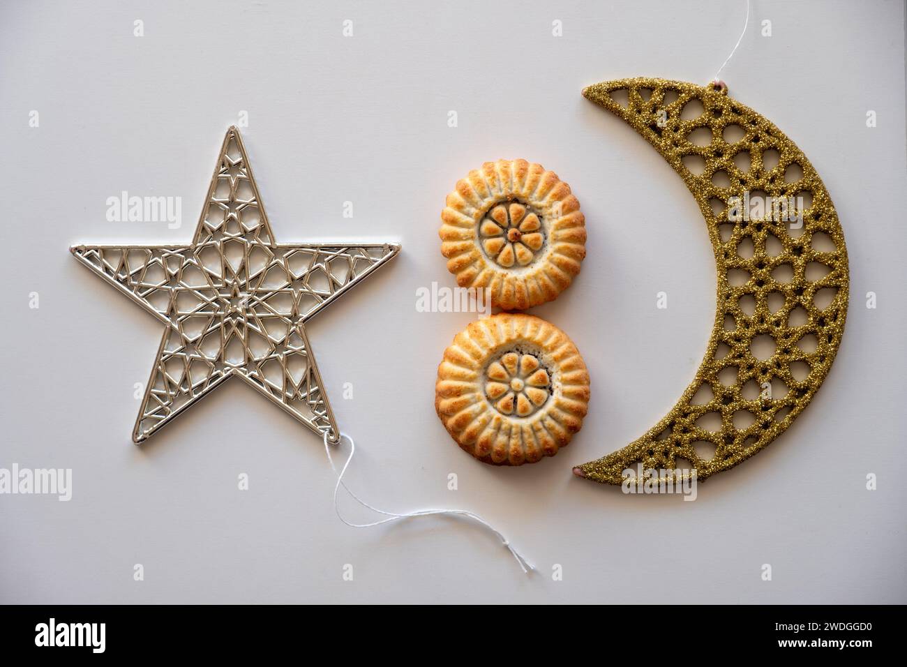 Variety of semolina maamoul cookies displayed with crescent ,star and ...