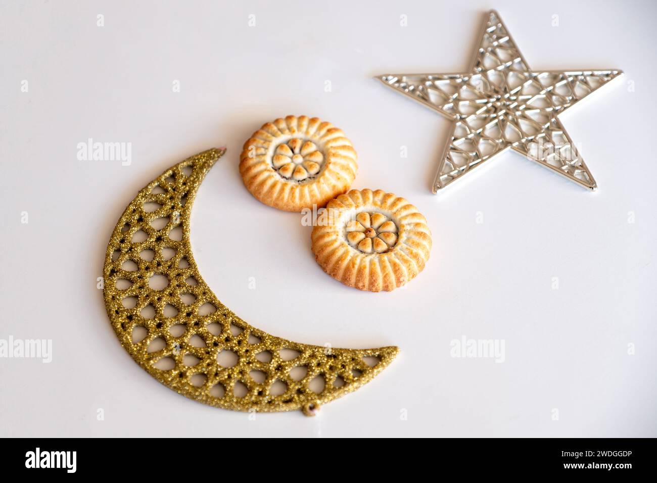 Variety of semolina maamoul cookies displayed with crescent ,star and ...