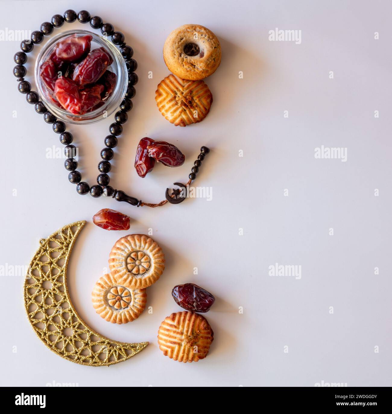 Variety of semolina maamoul cookies displayed with crescent ,star and ...