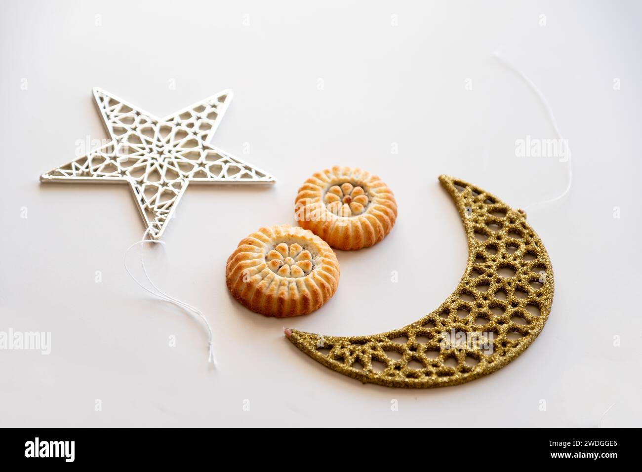 Variety of semolina maamoul cookies displayed with crescent ,star and ...