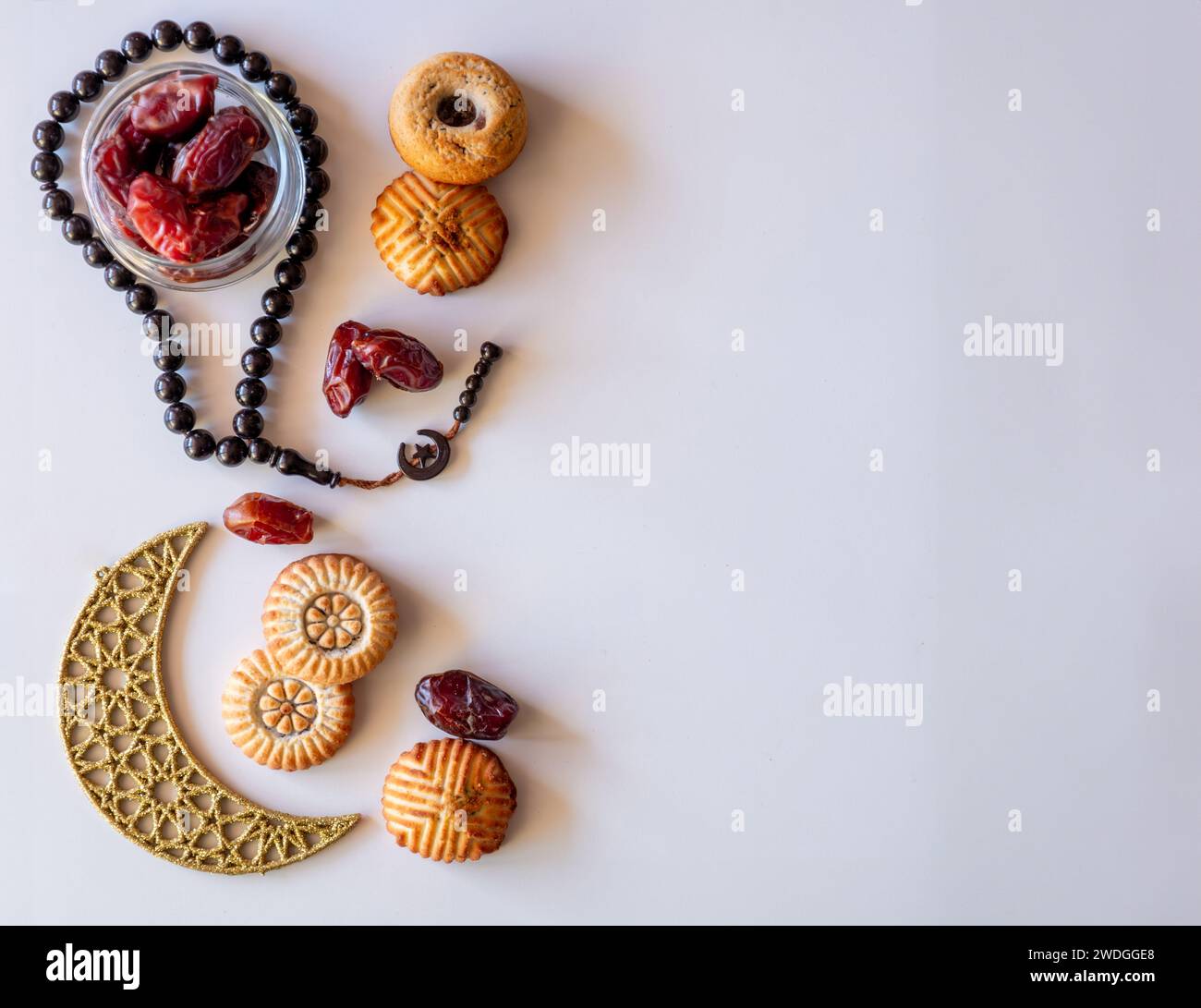 Variety of semolina maamoul cookies displayed with crescent ,star and ...